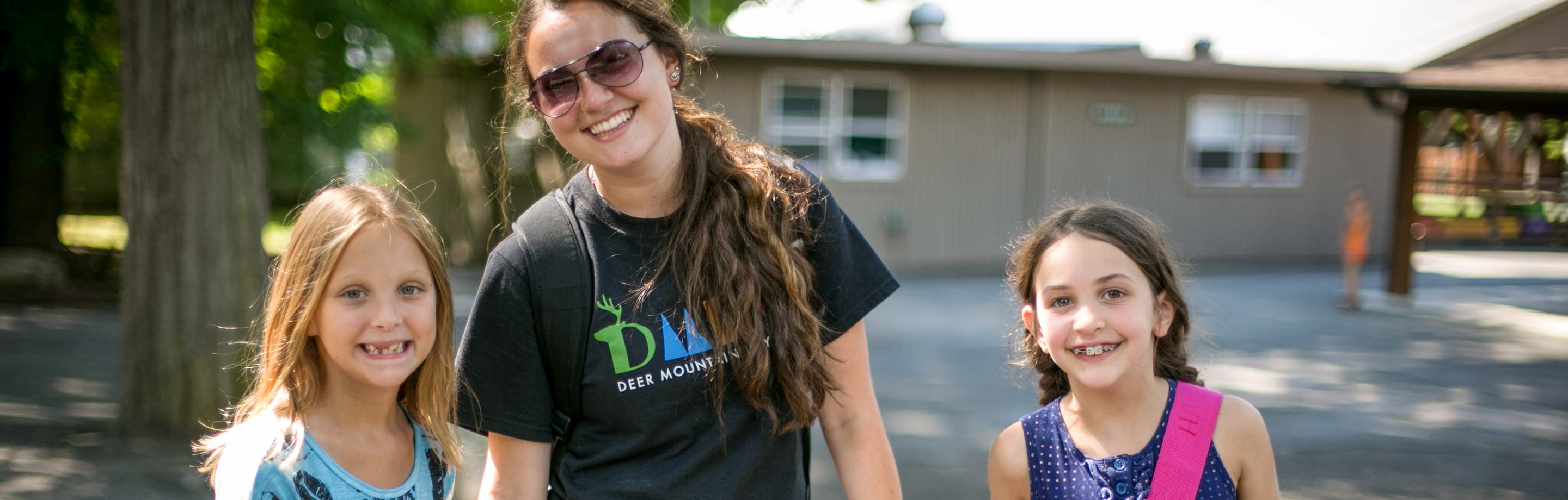 header-holding-hands – Deer Mountain Day Camp